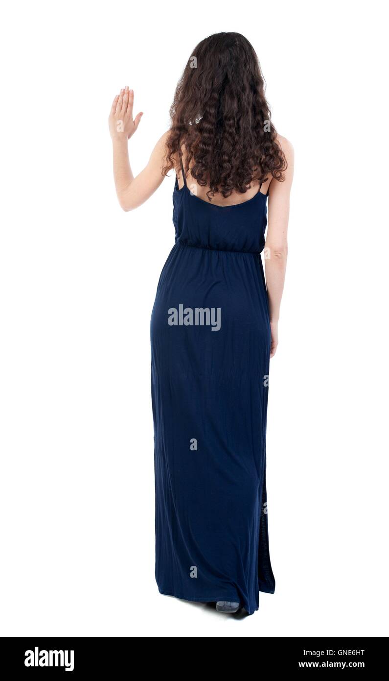 Back view of beautiful woman welcomes Stock Photo - Alamy