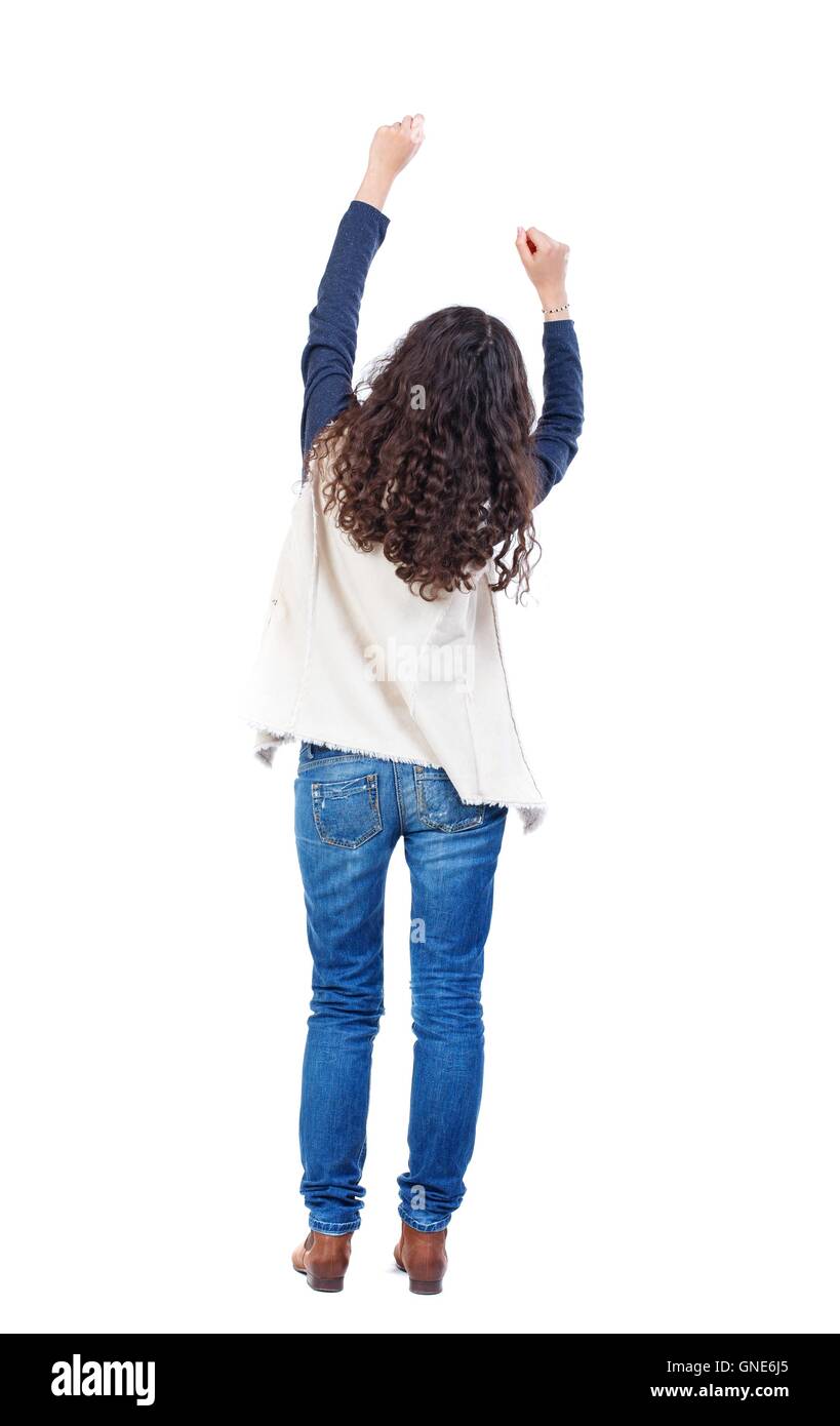 back view of dancing young beautiful woman. girl watching Stock Photo ...