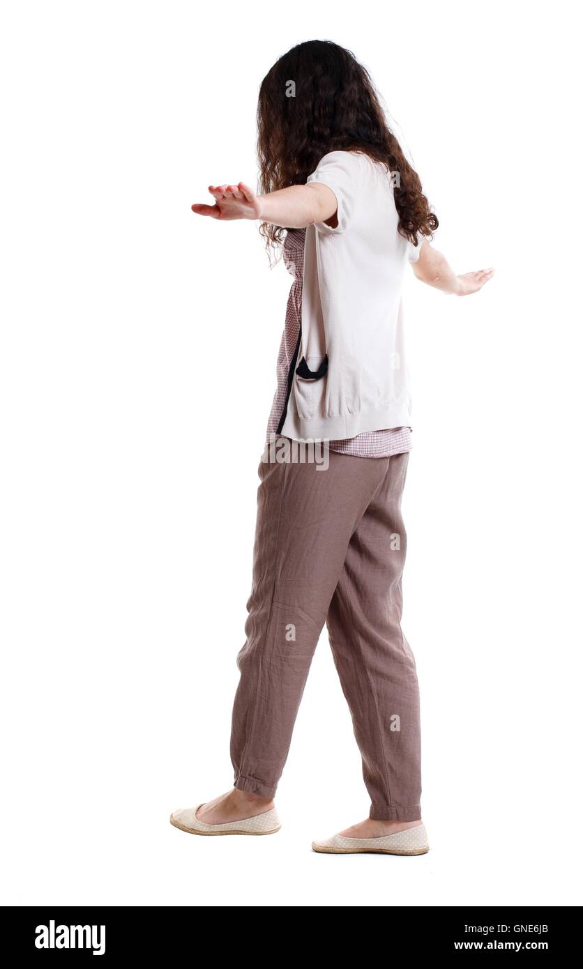 Back view woman is balancing on a tightrope Stock Photo - Alamy