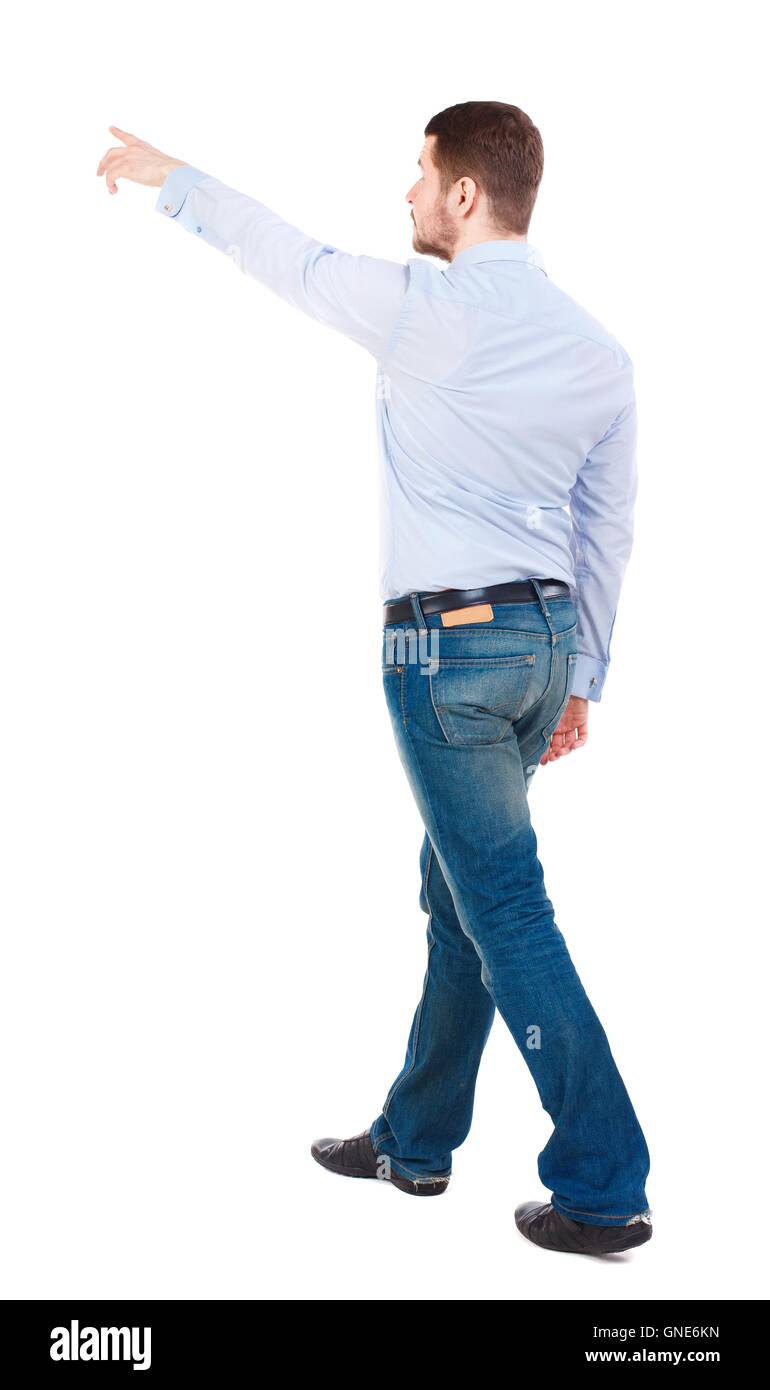 Back view of going business man pointing Stock Photo - Alamy