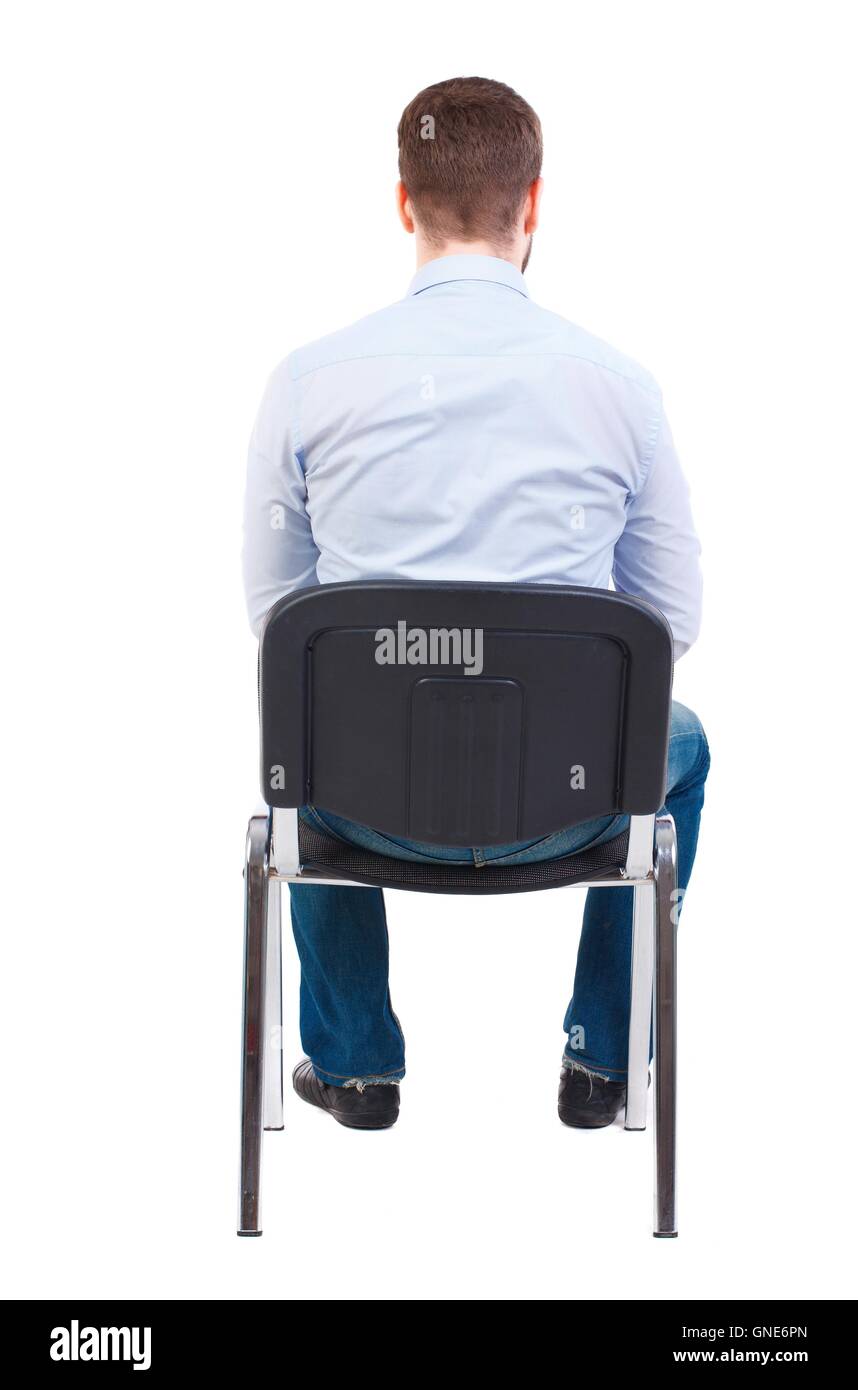 back view of business man sitting on chair Stock Photo - Alamy