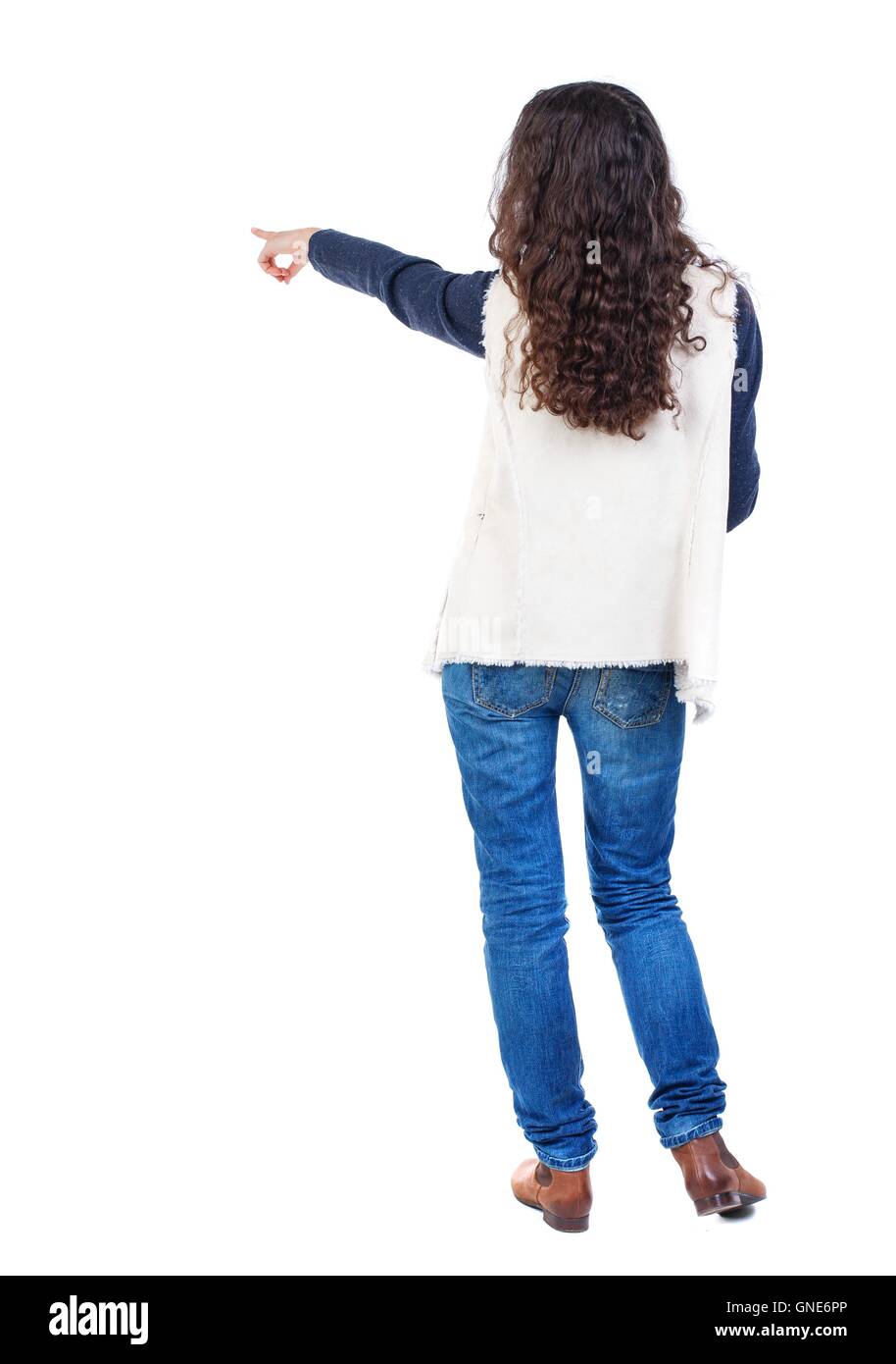 Back view of pointing woman. beautiful girl Stock Photo - Alamy