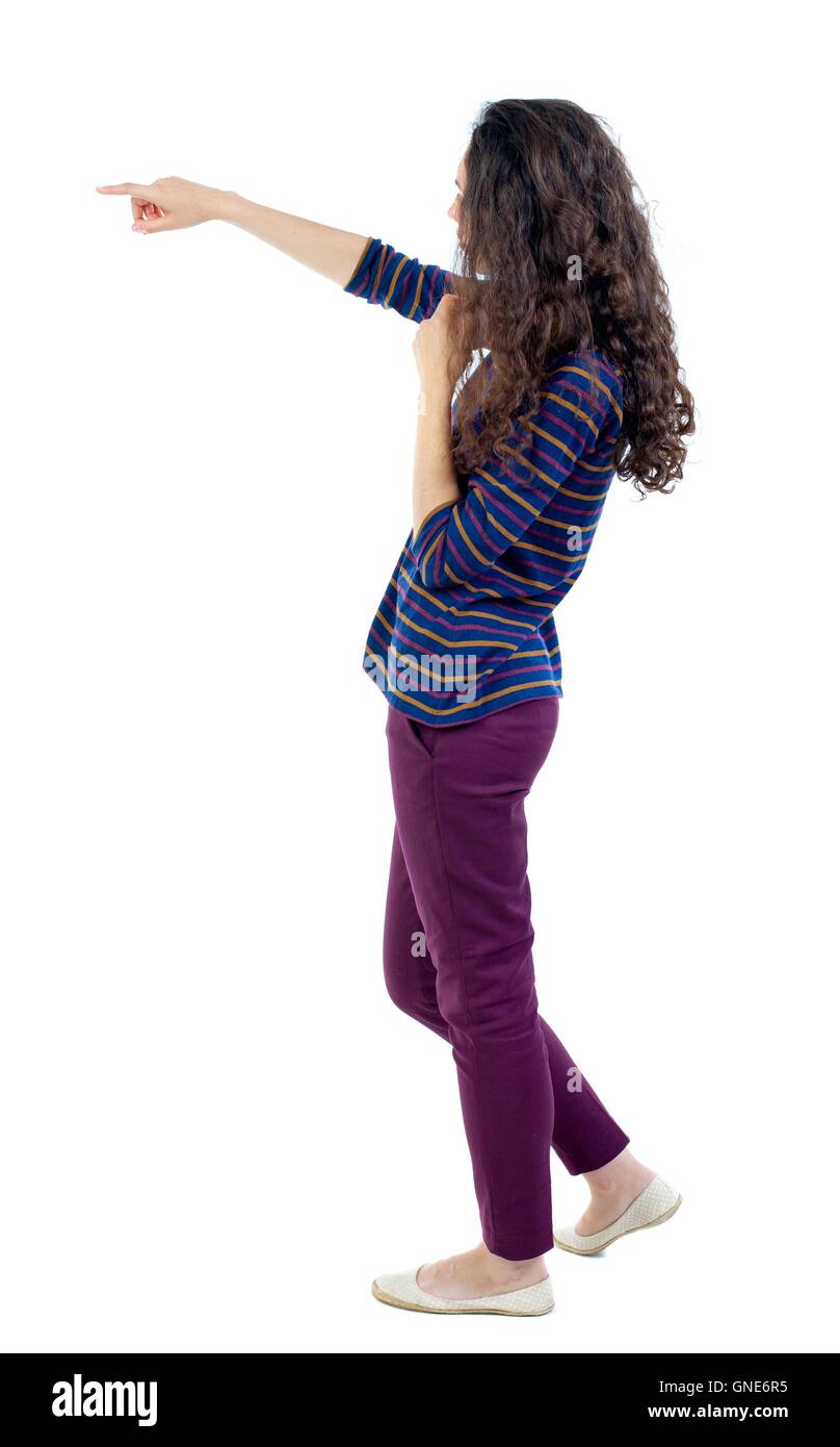 Back view of pointing woman. beautiful girl Stock Photo - Alamy