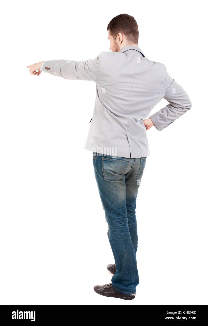 Back view of pointing business man Stock Photo - Alamy