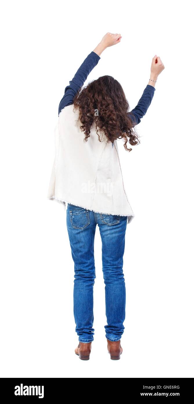 back view of dancing young beautiful woman. girl watching Stock Photo ...