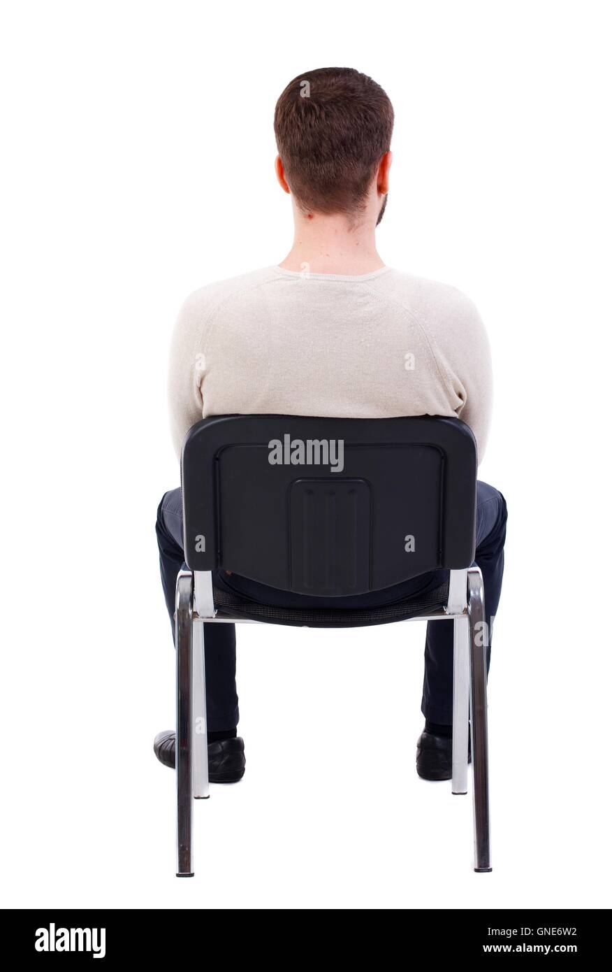back view of business man sitting on chair Stock Photo - Alamy