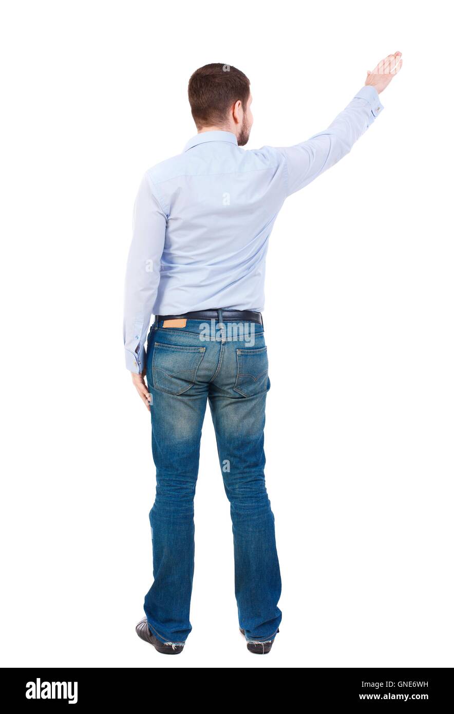 Back view of pointing business man Stock Photo - Alamy