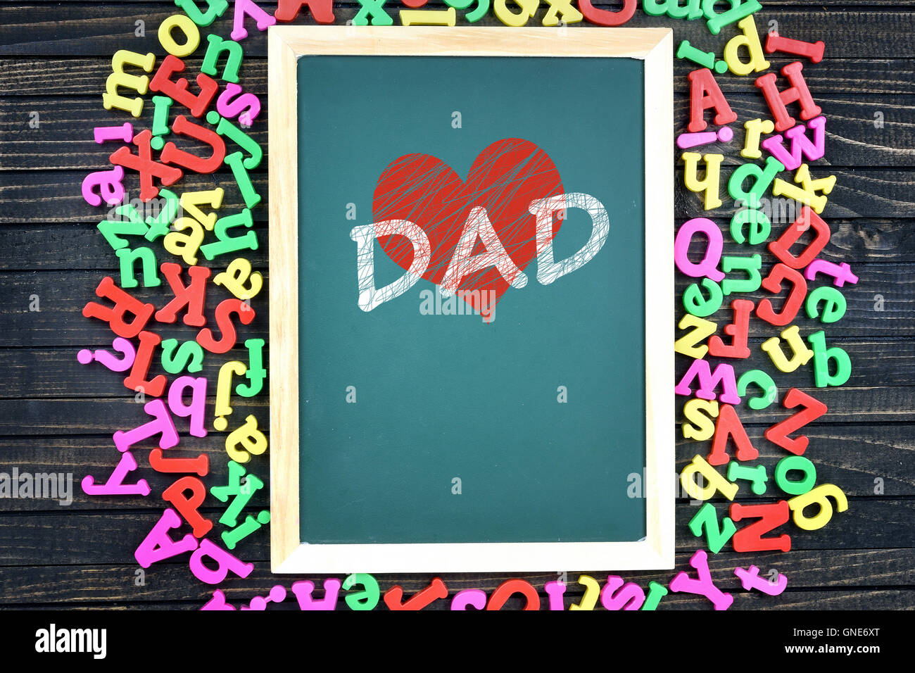 Love Dad text on school board and magnetic letters Stock Photo - Alamy