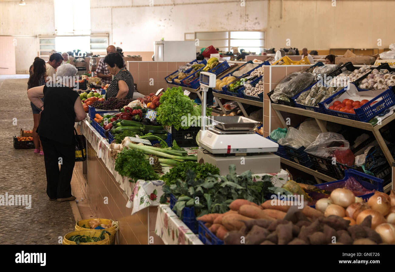 People buying food in Portuguese market Stock Photo - Alamy