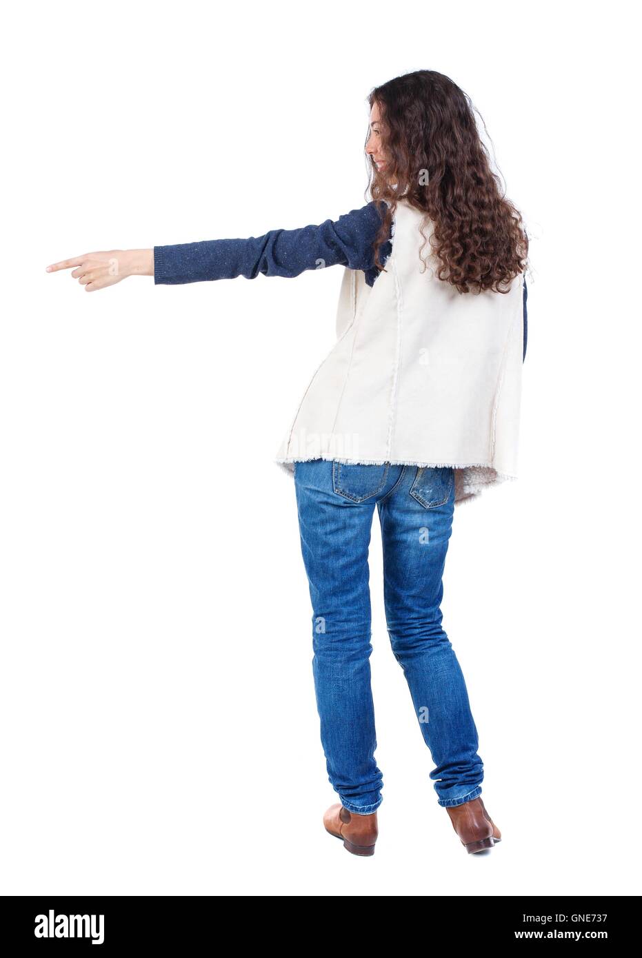 Back view of pointing woman. beautiful girl Stock Photo - Alamy
