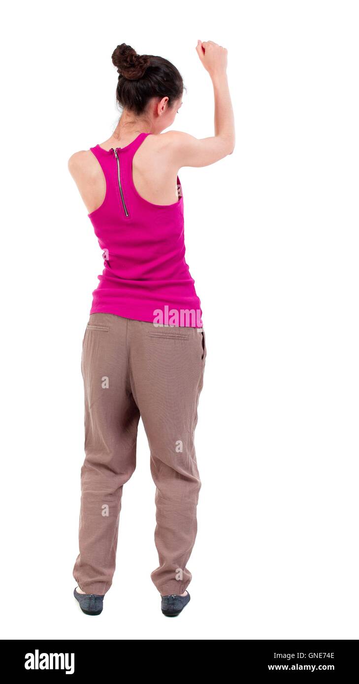 back view of dancing young beautiful woman. girl watching Stock Photo ...