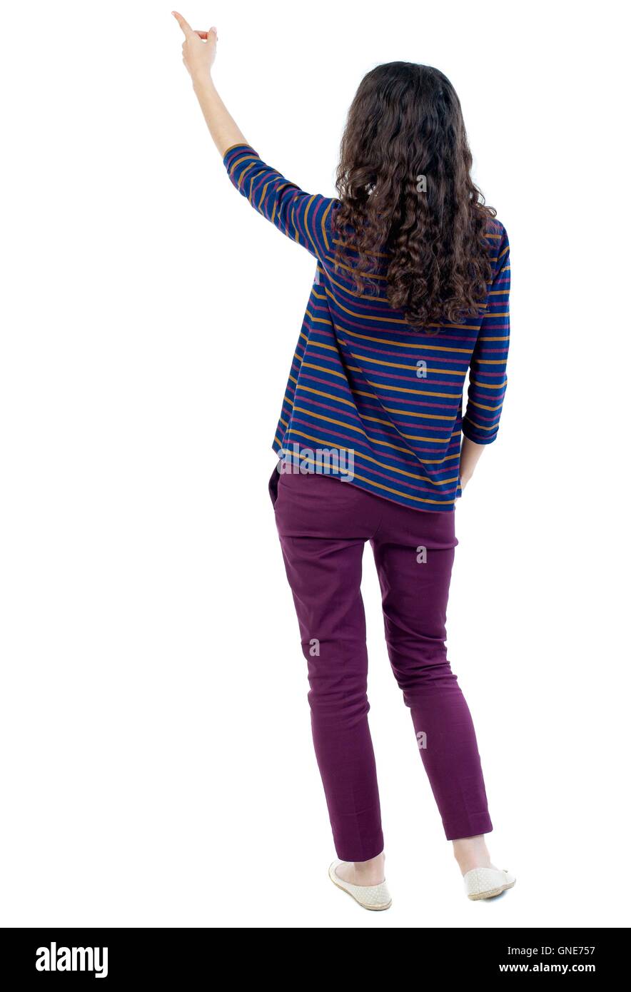 Back view of pointing woman. beautiful girl Stock Photo - Alamy