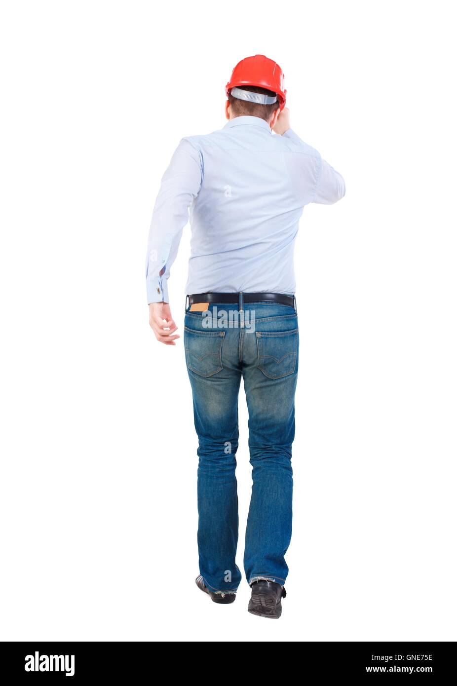 Back view of running engineer in helmet Stock Photo - Alamy