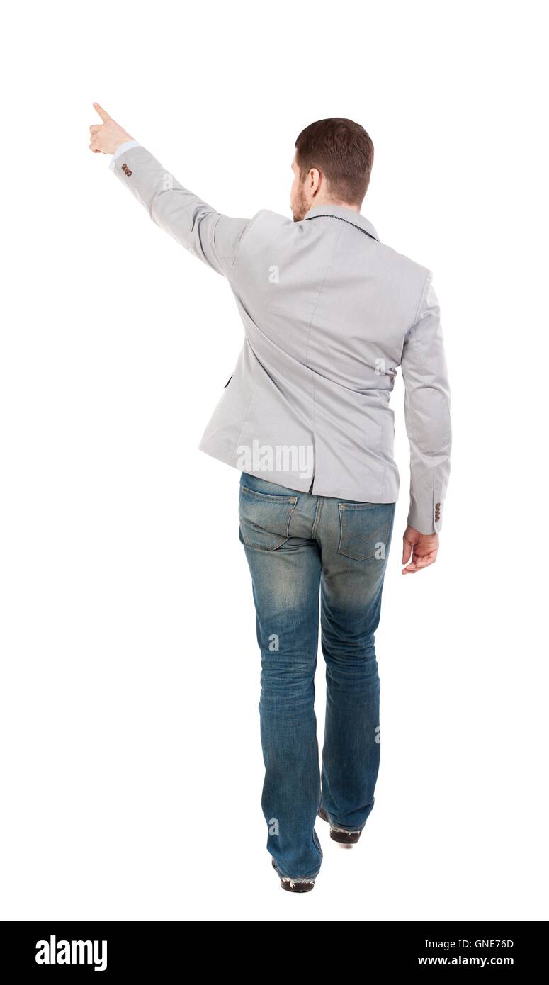 Back view of going business man pointing Stock Photo - Alamy