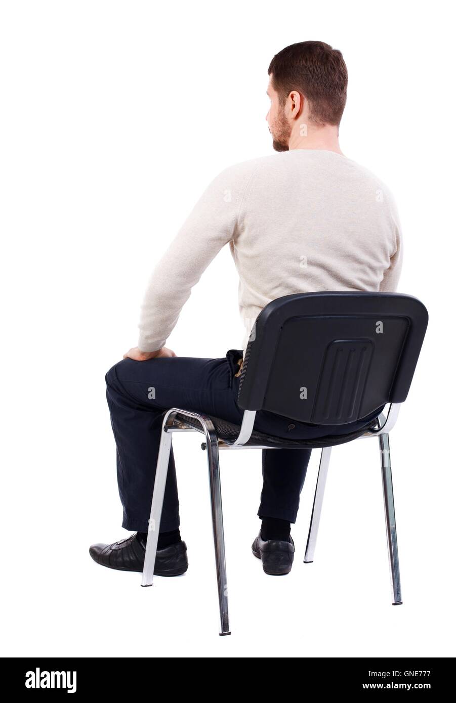back view of business man sitting on chair Stock Photo - Alamy