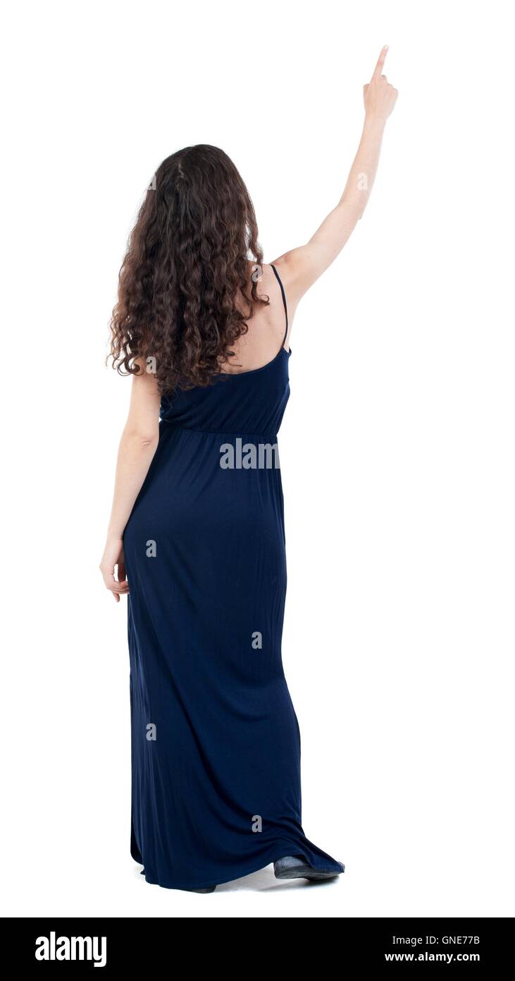 Back view of pointing woman. beautiful girl Stock Photo - Alamy
