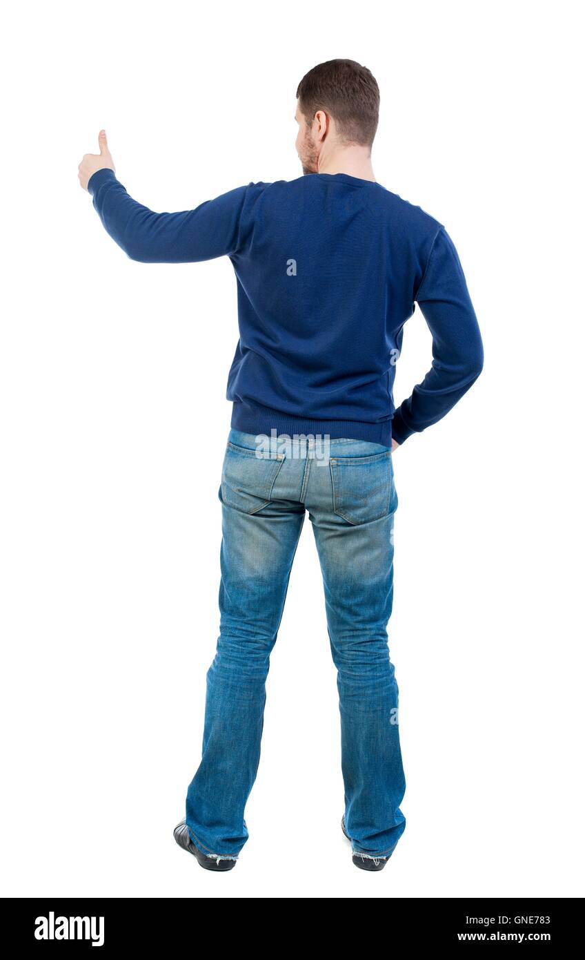 Back view of business man shows thumbs up Stock Photo - Alamy