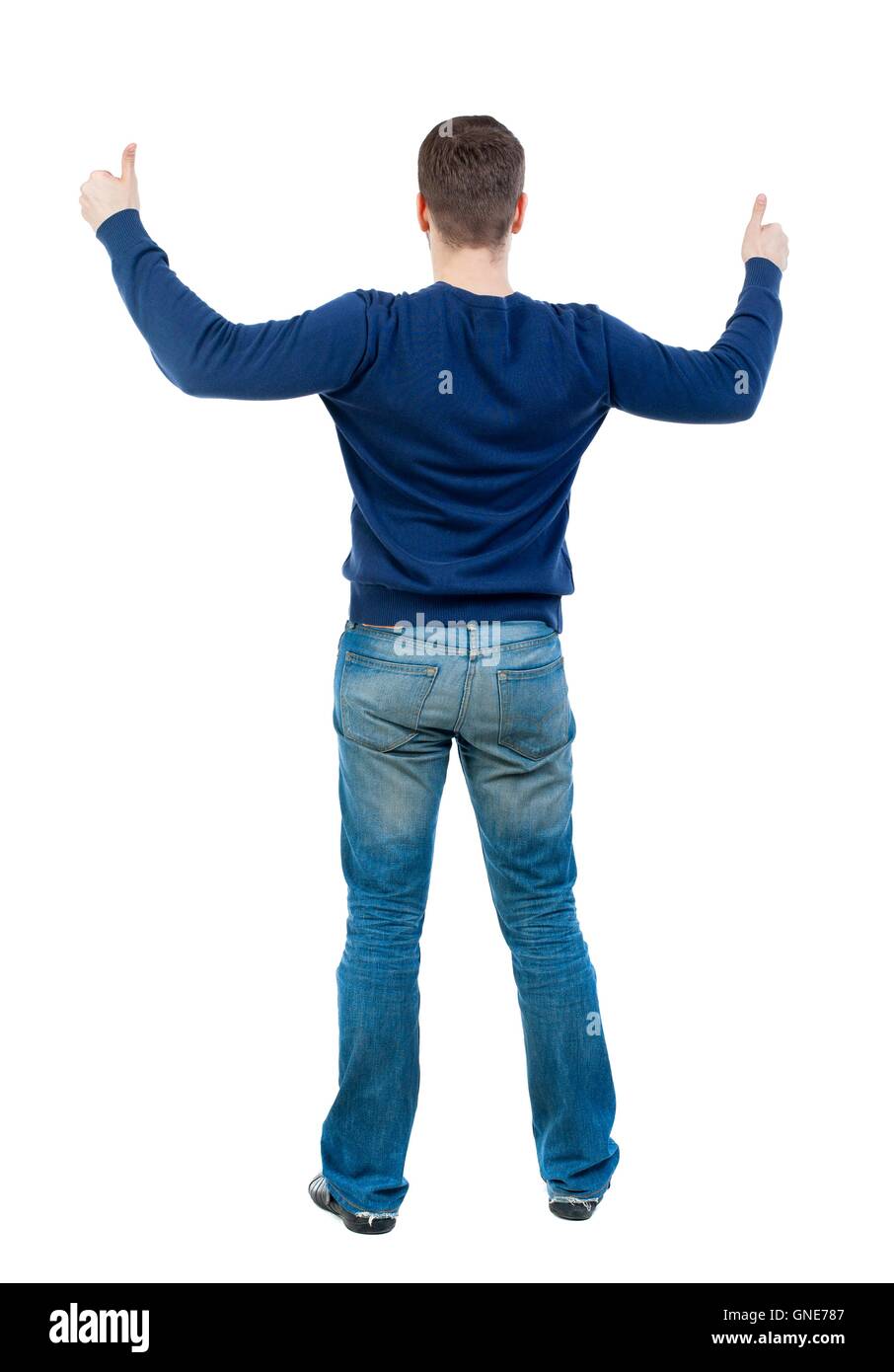 Back view of business man shows thumbs up Stock Photo - Alamy