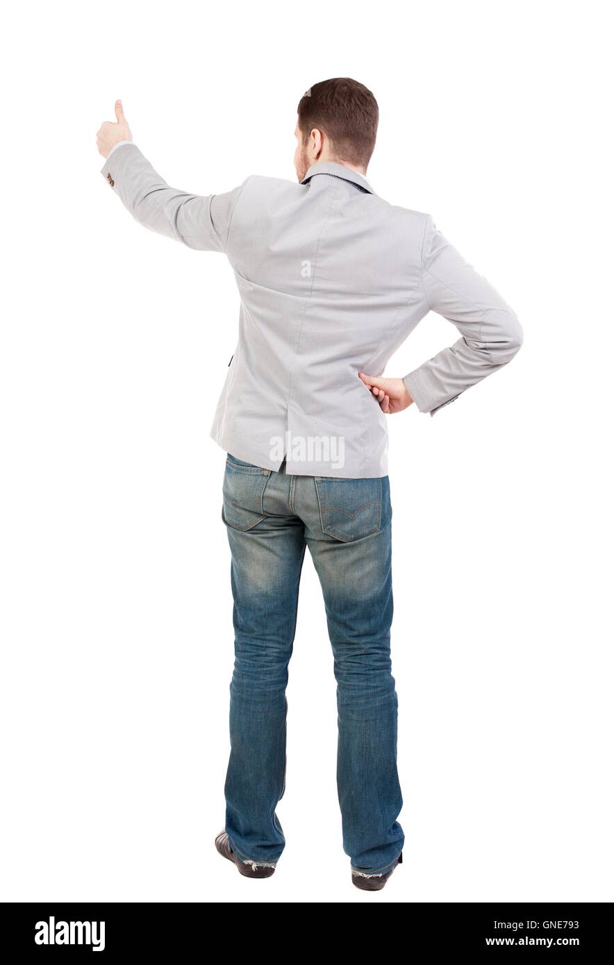 Back view of business man shows thumbs up Stock Photo - Alamy