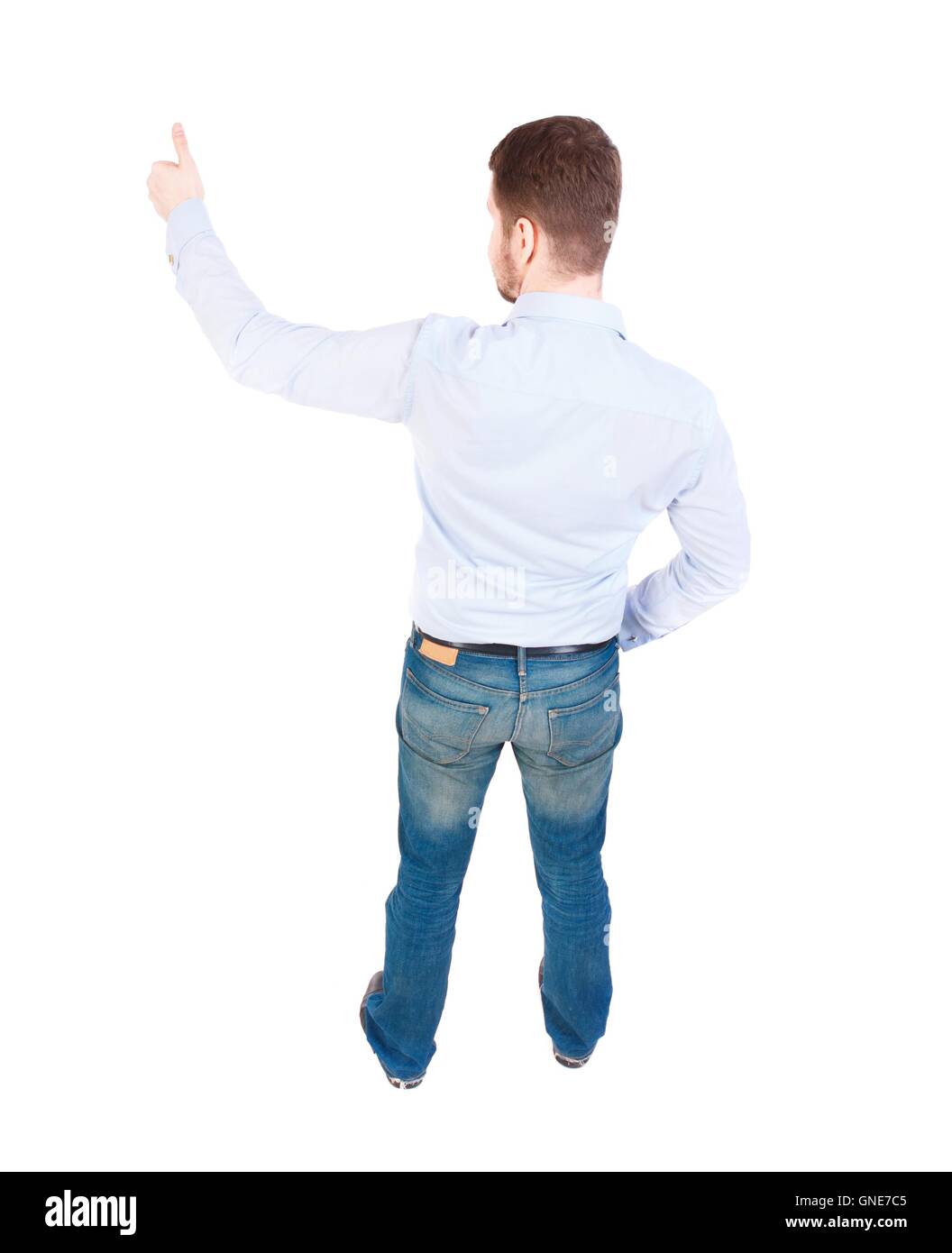 Back view of business man shows thumbs up Stock Photo - Alamy