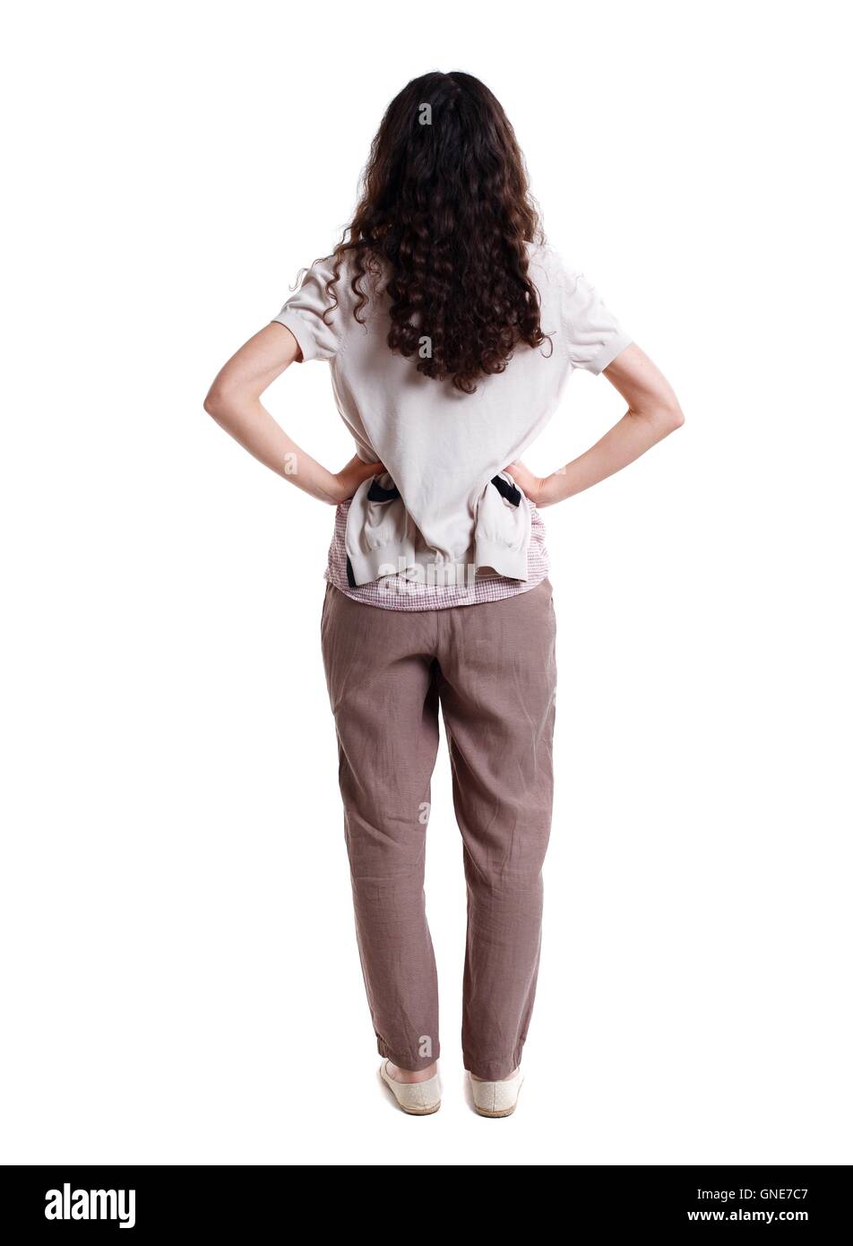 back view of standing young beautiful woman Stock Photo - Alamy