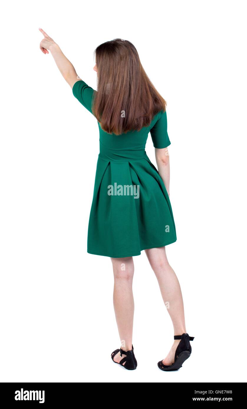 Back view of pointing woman. beautiful girl Stock Photo - Alamy