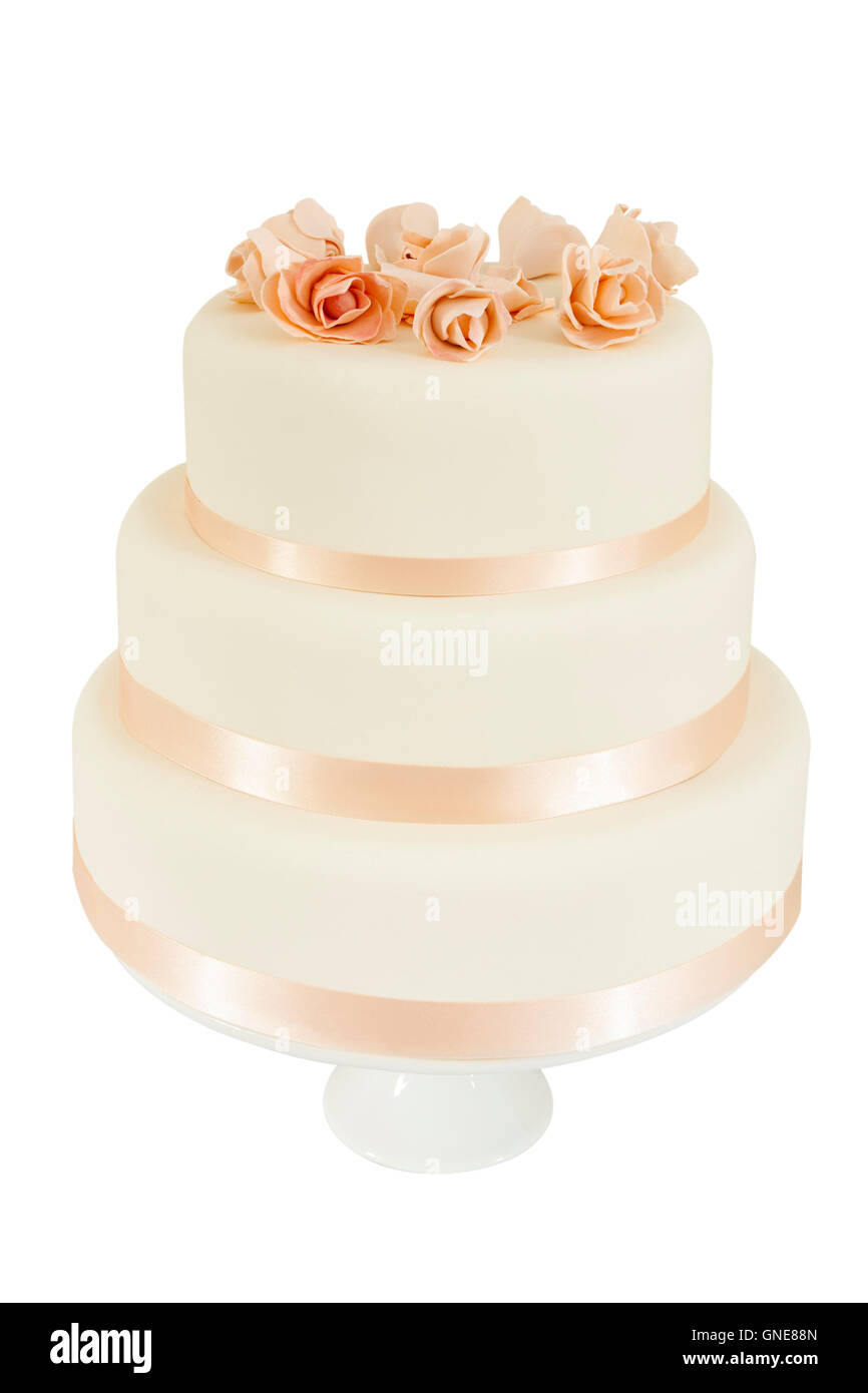 Wedding cake with rose decoration. Cut out and isolated on a white ...