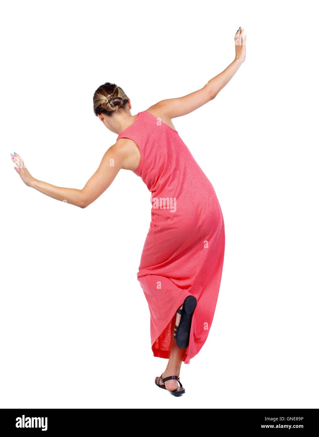 Woman balancing rear view Cut Out Stock Images & Pictures - Alamy