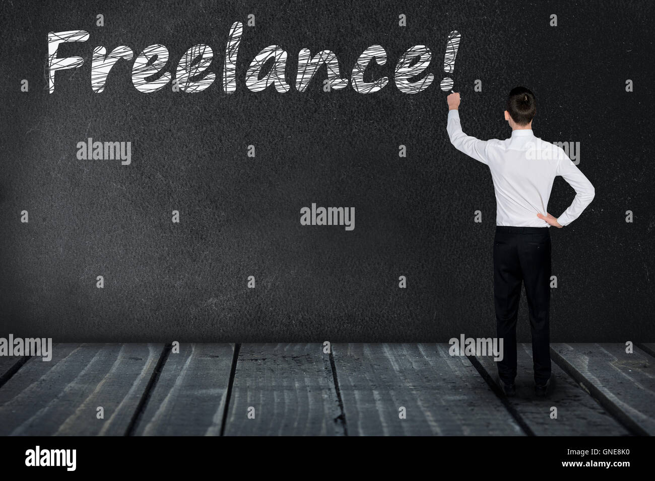 Freelance text write on black board Stock Photo - Alamy