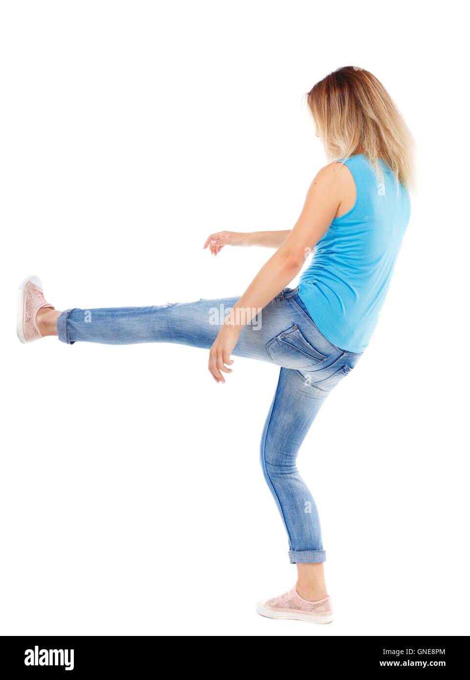 back view of woman funny fights waving his arms and legs Stock Photo ...