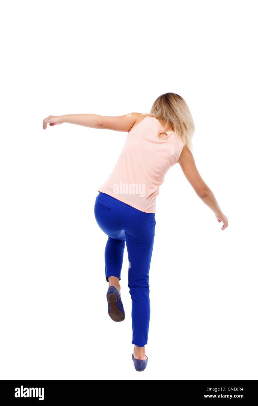 Woman balancing rear view Cut Out Stock Images & Pictures - Alamy