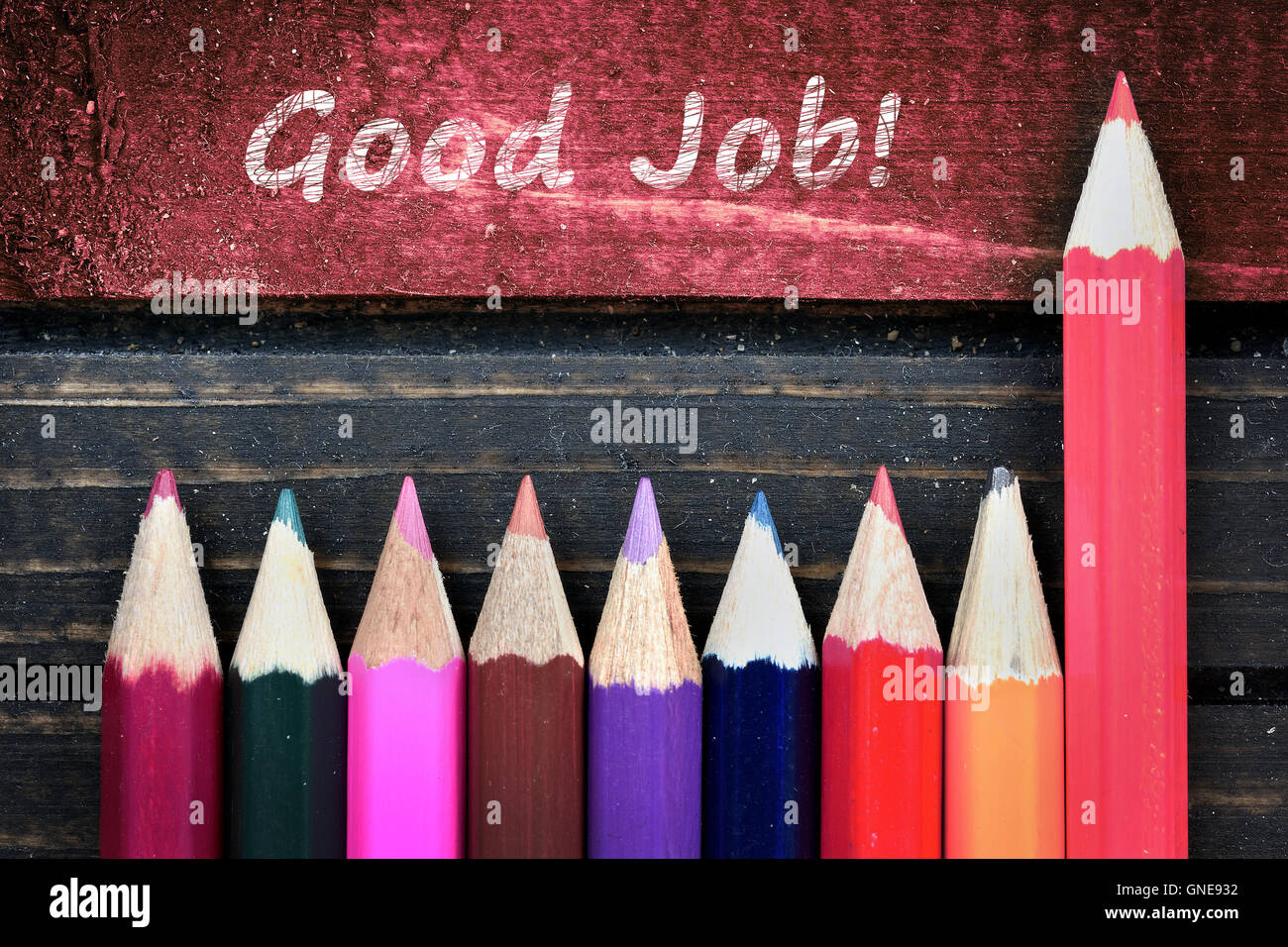 Good Job text and group of pencil on wooden table Stock Photo - Alamy