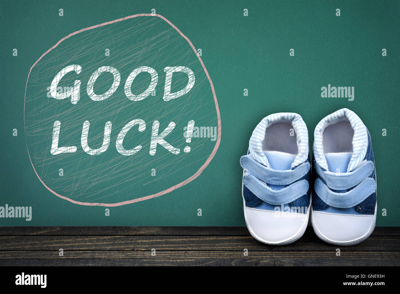 Good Luck text on school table and kid shoes Stock Photo - Alamy