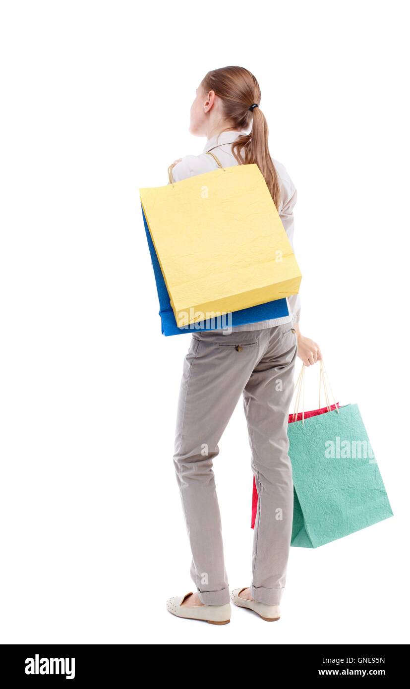 back view of woman with shopping bags Stock Photo - Alamy