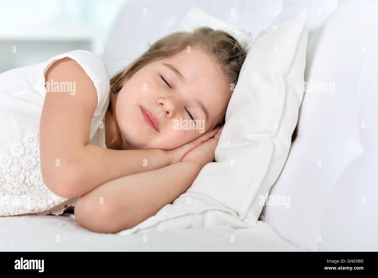 Cute little girl sleeping Stock Photo - Alamy