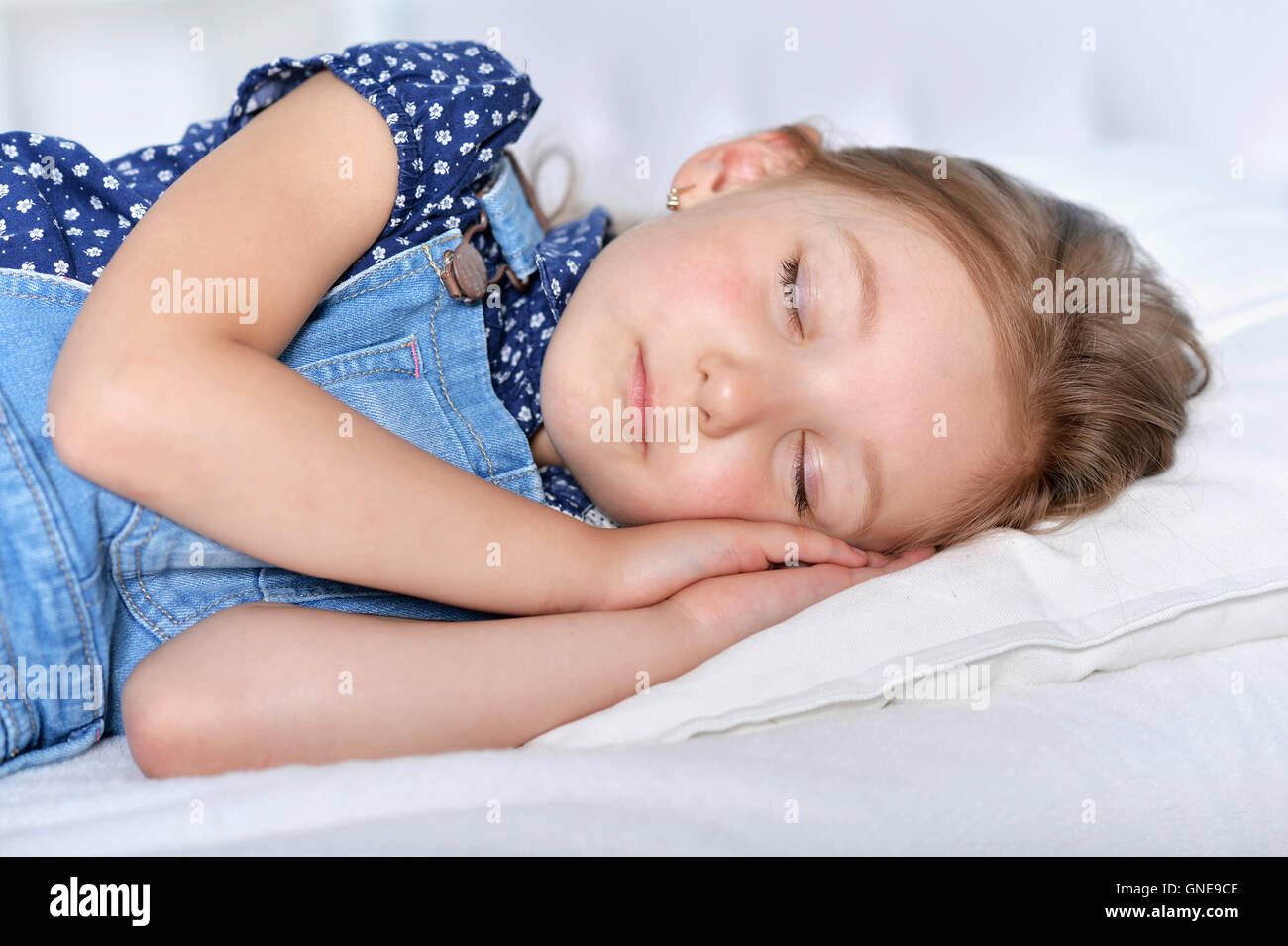 Cute little girl sleeping Stock Photo - Alamy