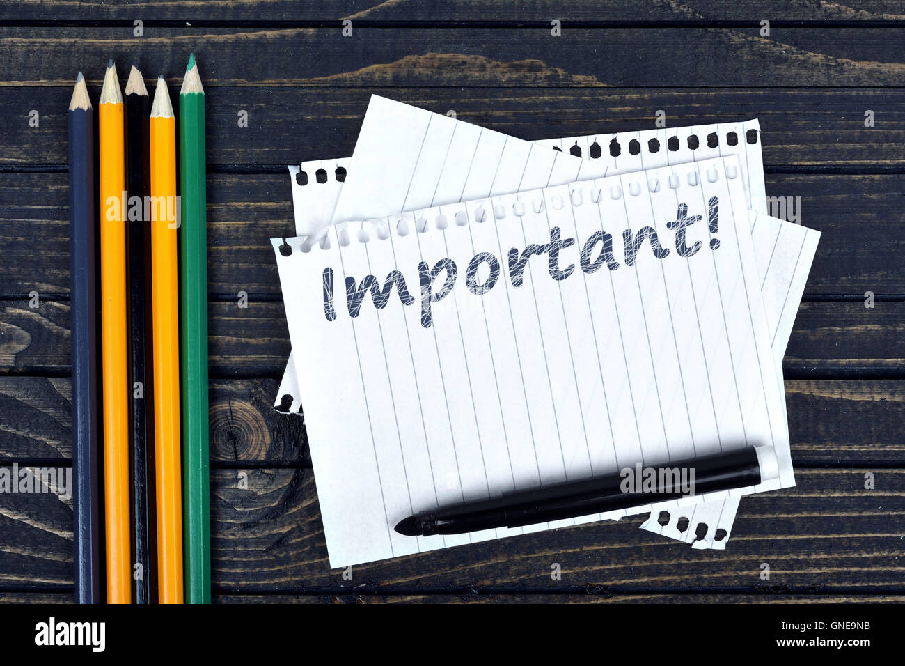 Important text on notepad and office tools on wooden table Stock Photo ...