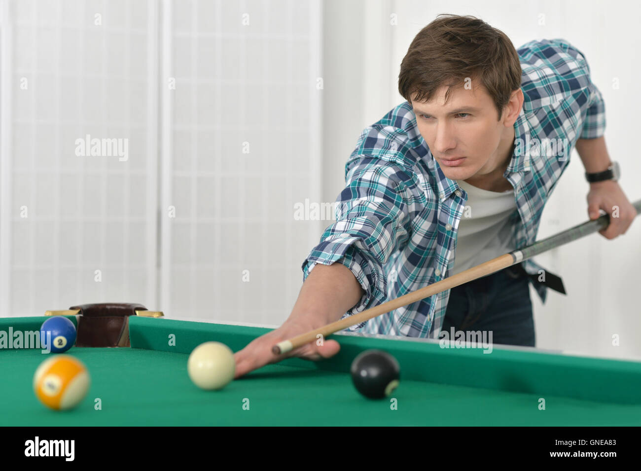 man playing billiards in billiard club Stock Photo - Alamy