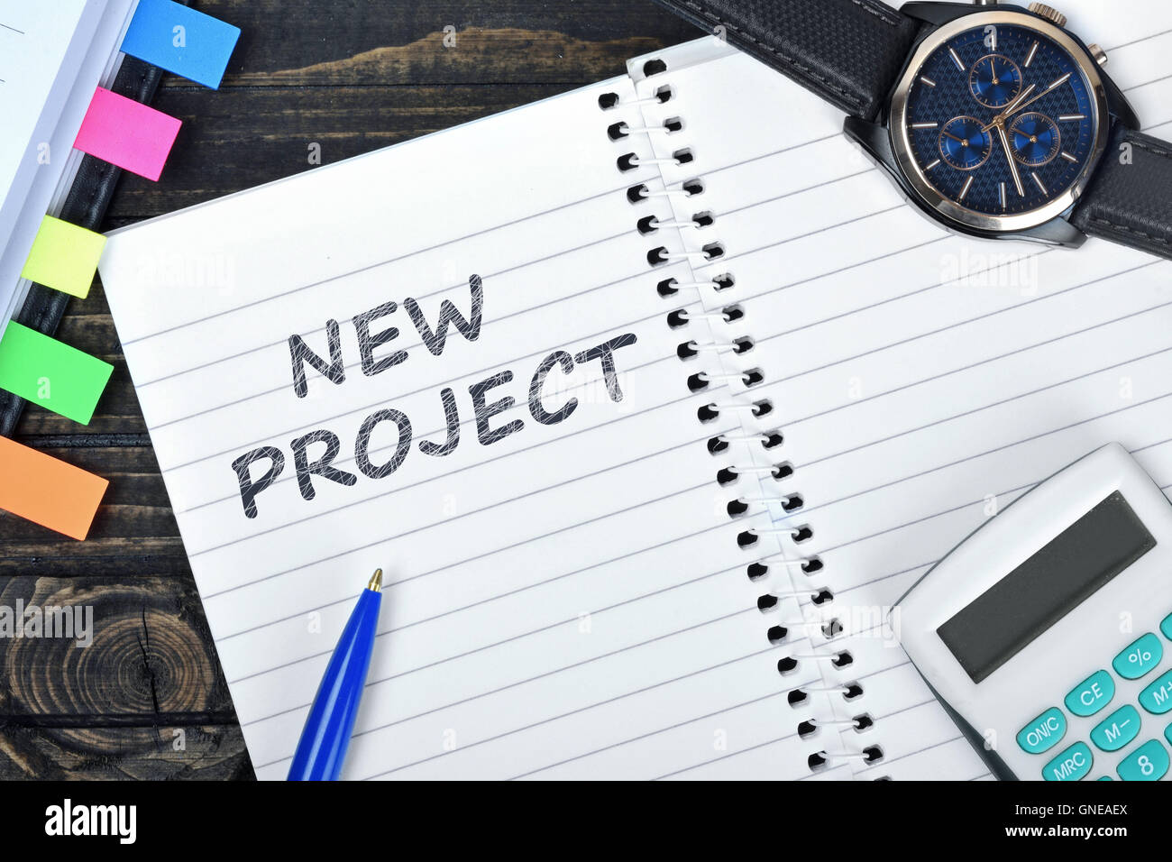 New Project text on notepad and watch on desk Stock Photo - Alamy