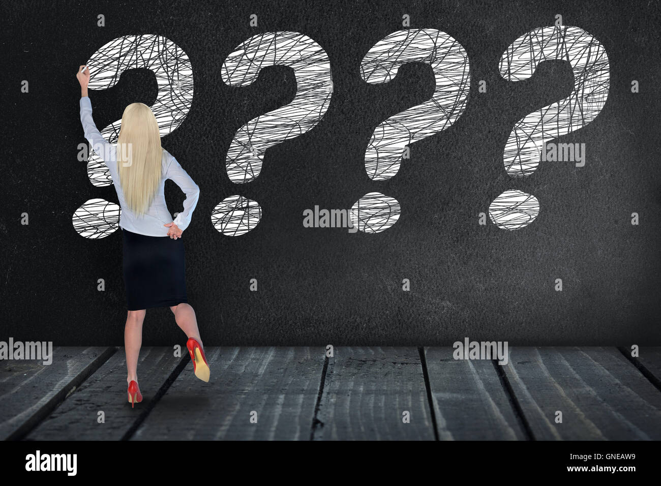 Woman holding blackboard question hi-res stock photography and images ...