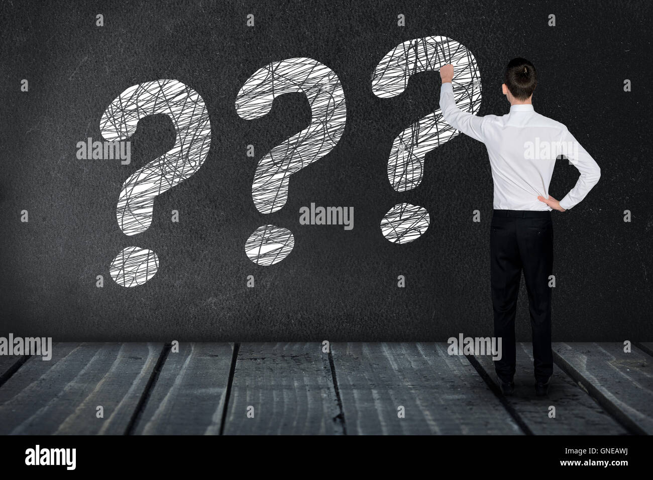 Questions group write on black board Stock Photo - Alamy
