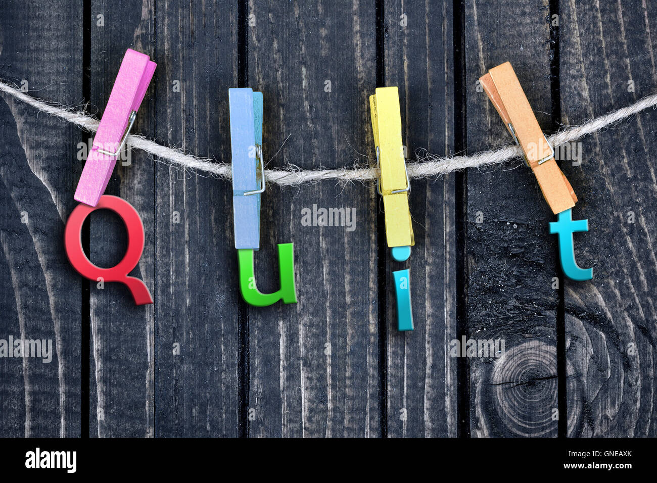 word hanging on clips and wooden wall Stock Photo - Alamy