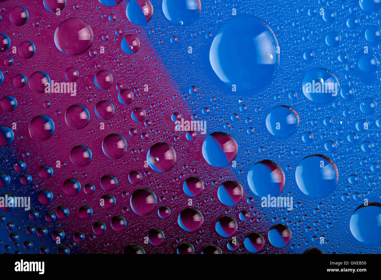 blue and pink water drops background Stock Photo - Alamy