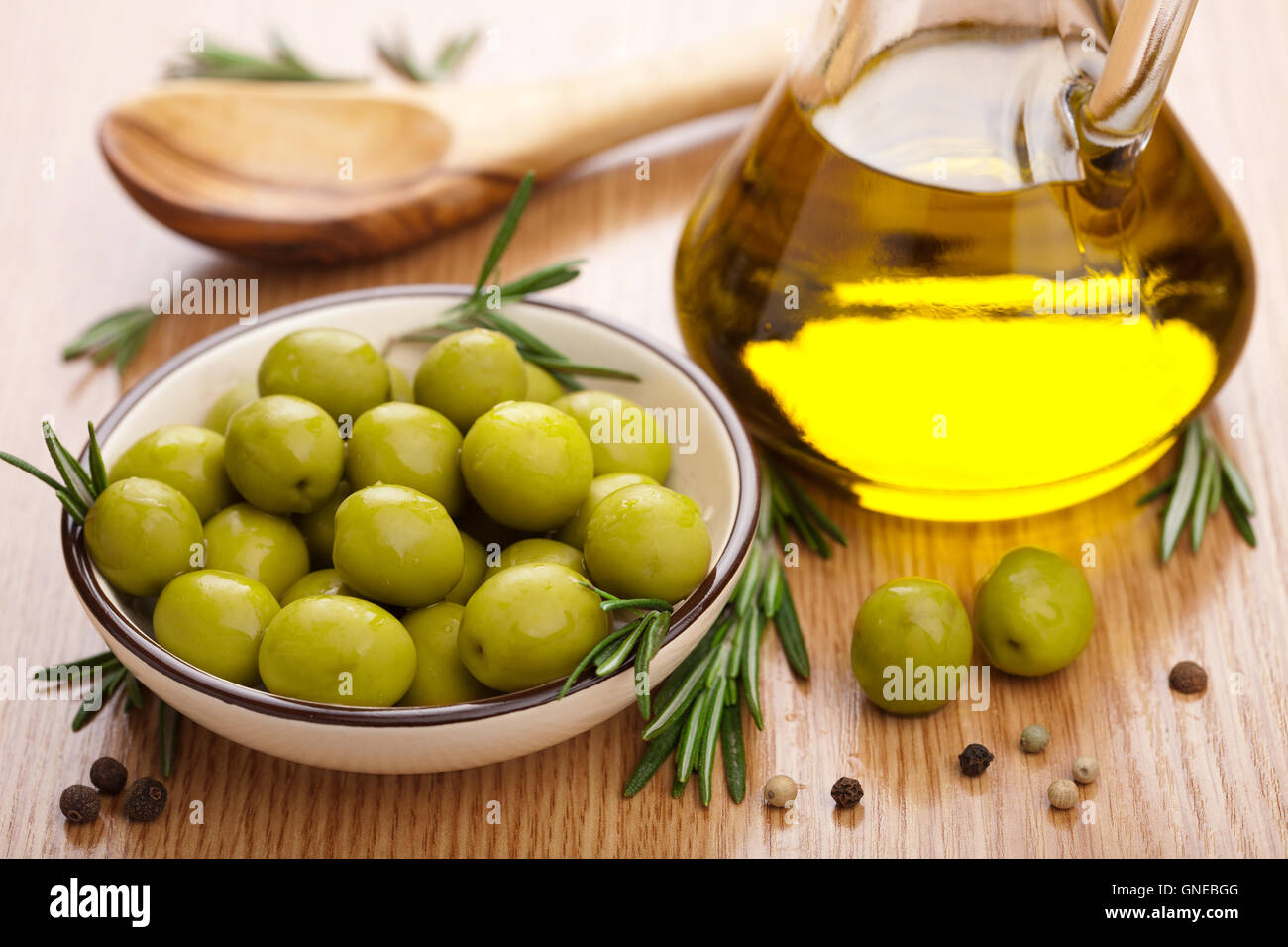 green olives and oil Stock Photo - Alamy