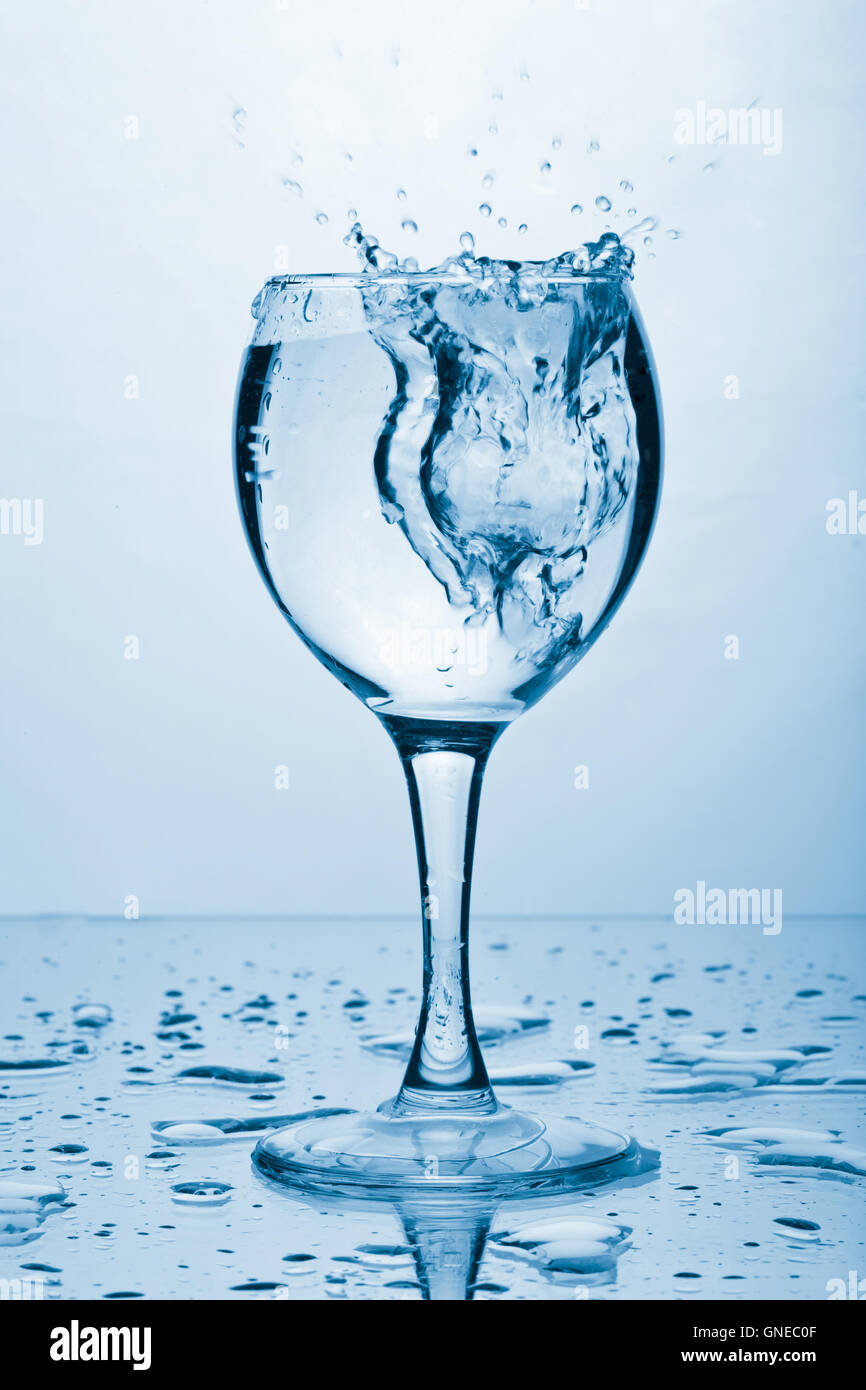 pure water splashing into glass Stock Photo - Alamy