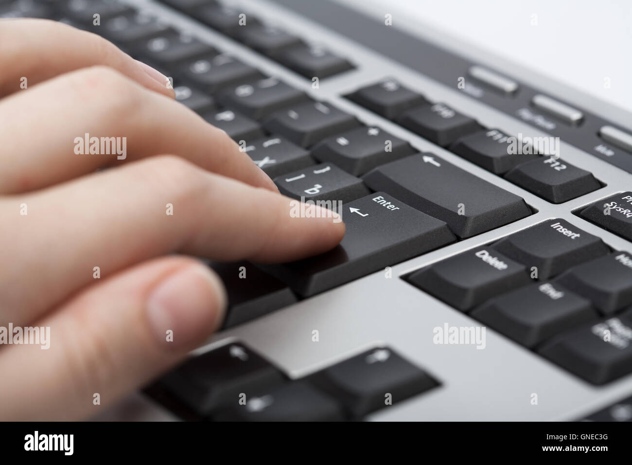 hand over keyboard Stock Photo - Alamy