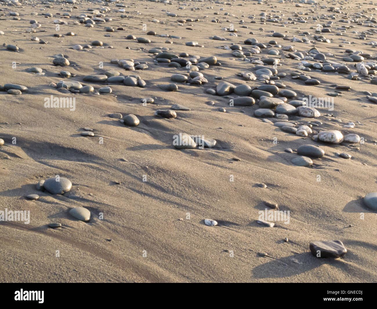 Background texture pattern of tidal beach pebbles Stock Photo - Alamy