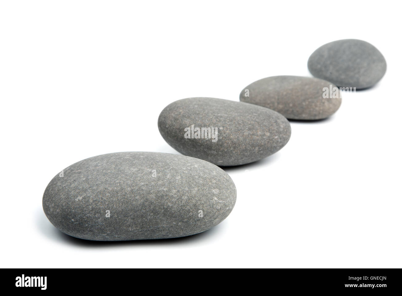 grey spa stones isolated Stock Photo - Alamy
