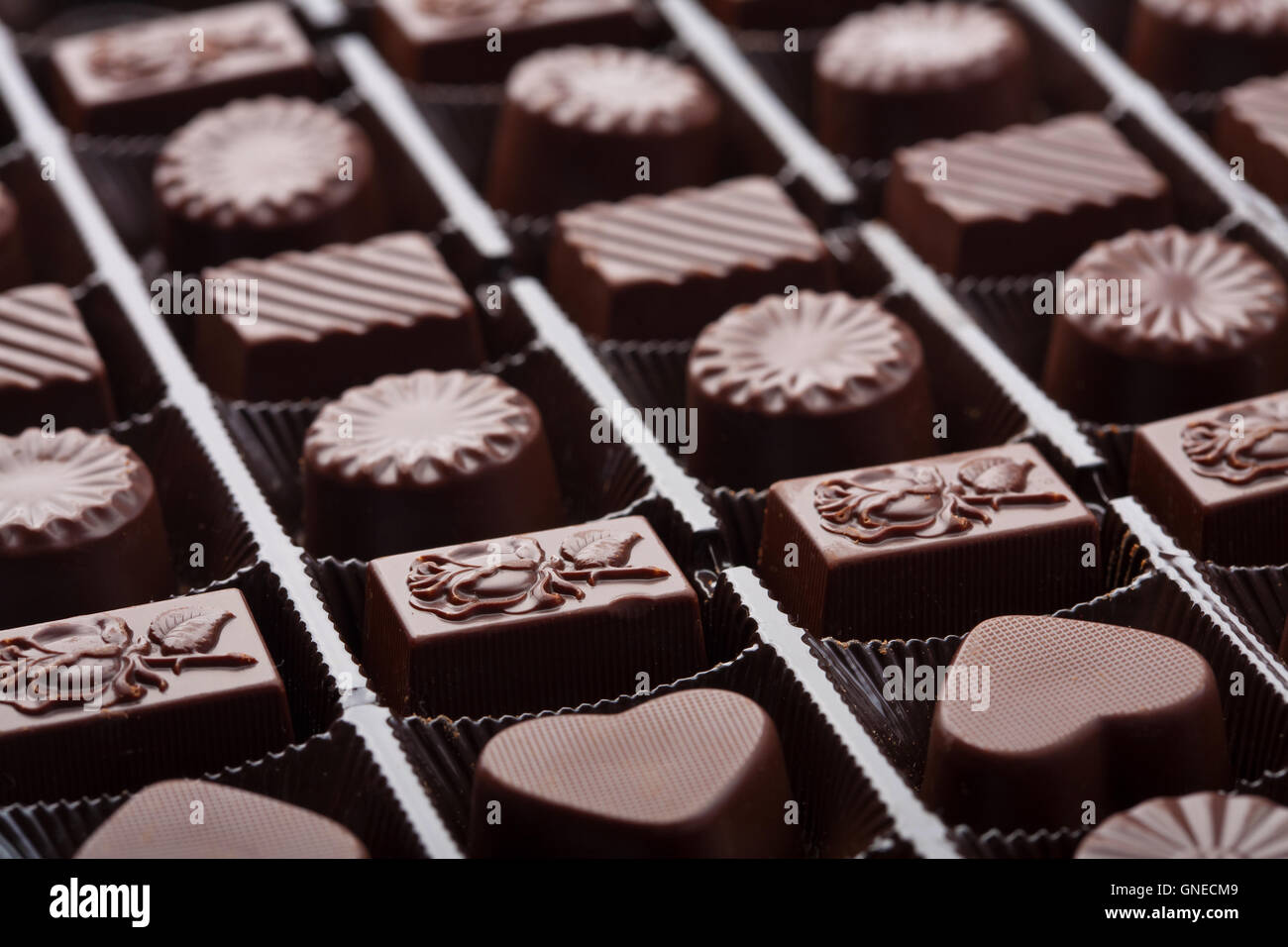 assorted chocolate candies in box Stock Photo - Alamy
