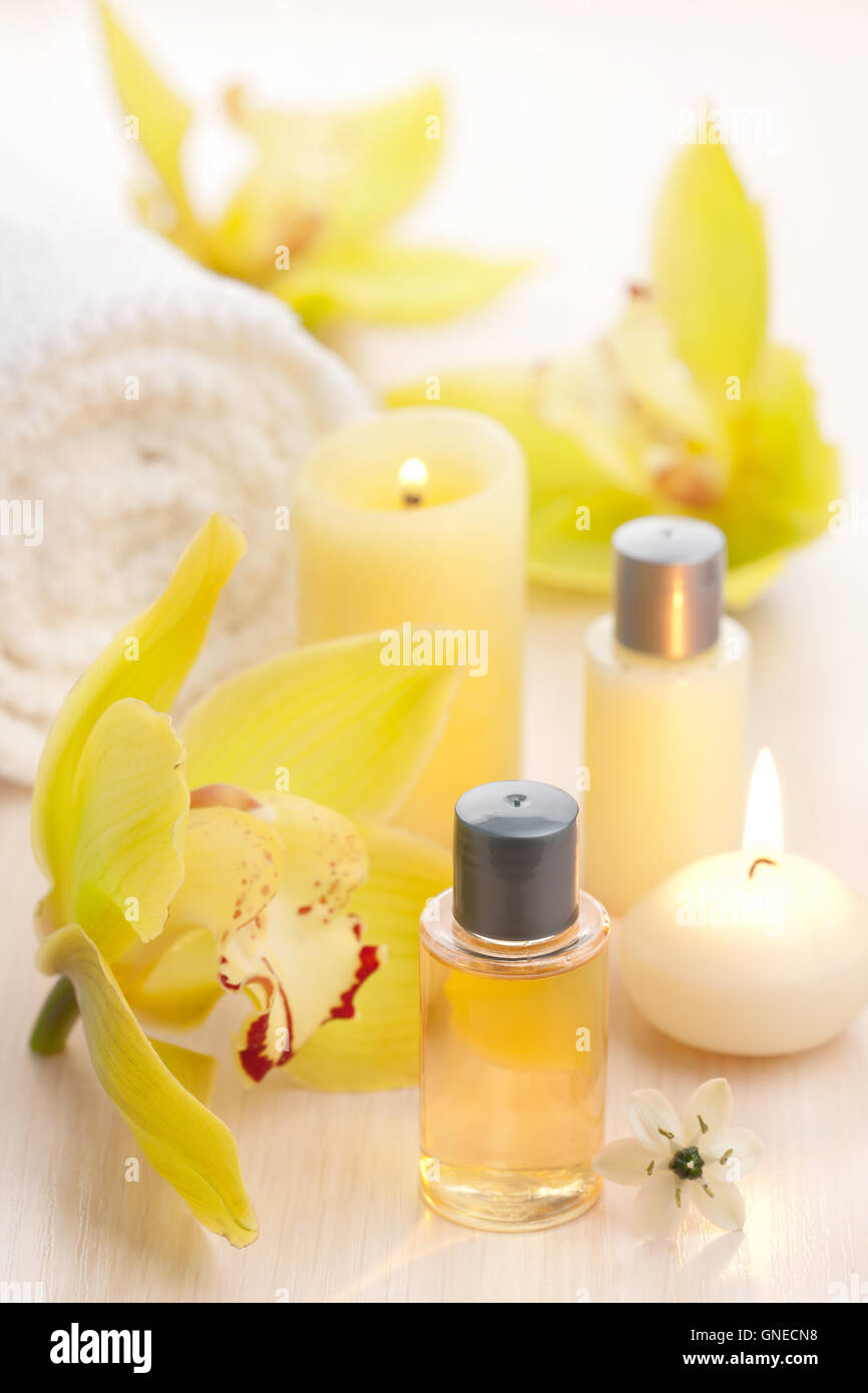 spa set with essential oils and flowers Stock Photo - Alamy